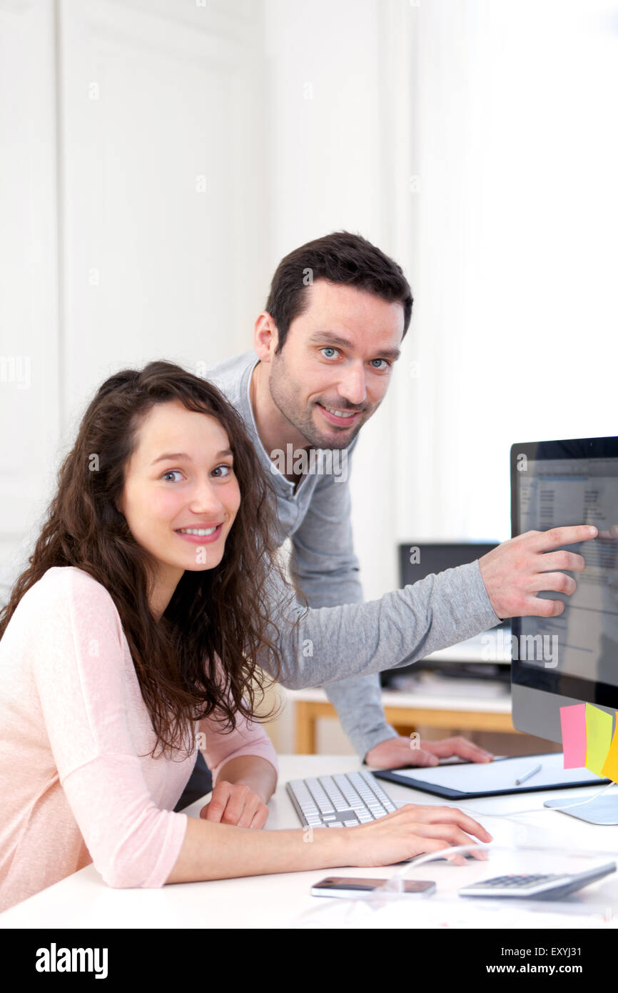 Office man working help computer hi-res stock photography and images ...