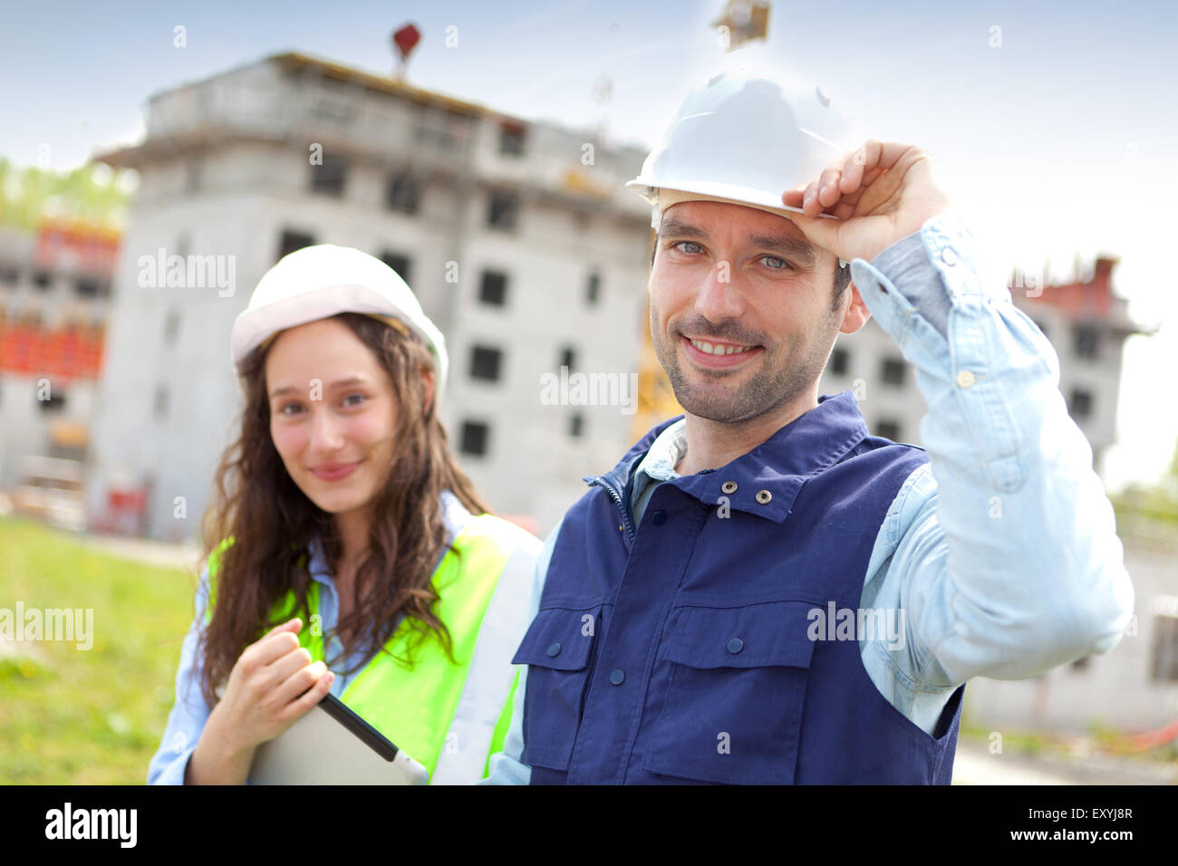 Portrait of co-workers on a construction site Stock Photo - Alamy
