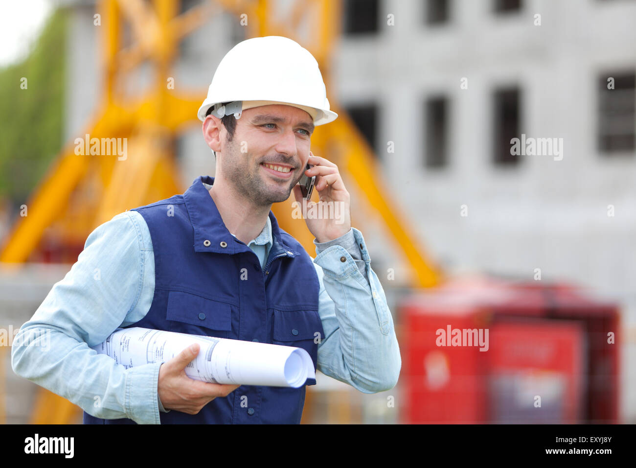 View of a Worker on a construction site Stock Photo - Alamy