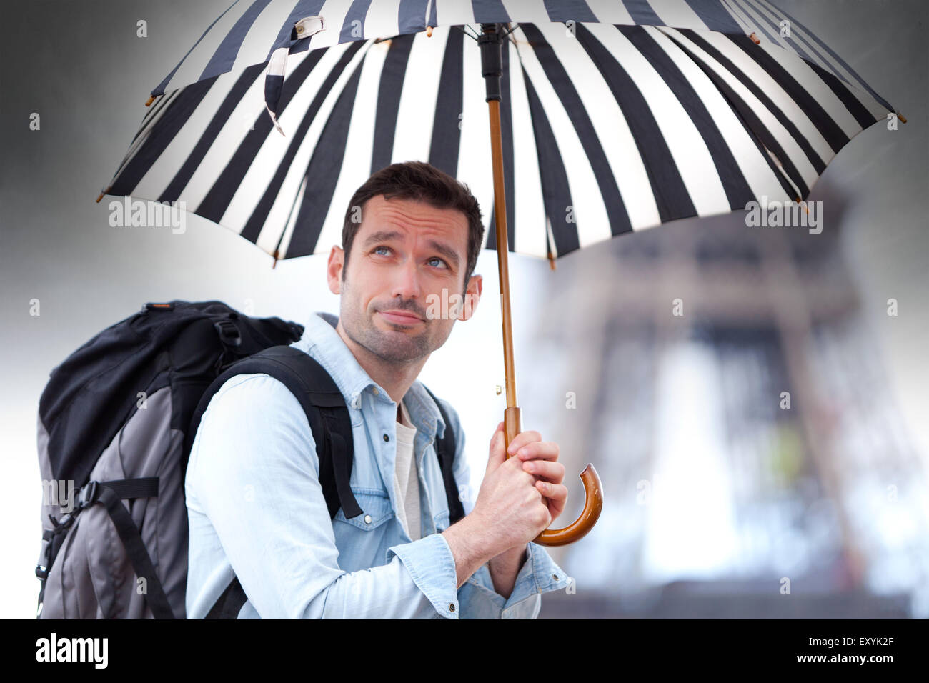 View of a Young attractive man suffering rain in PARIS in Paris Stock ...