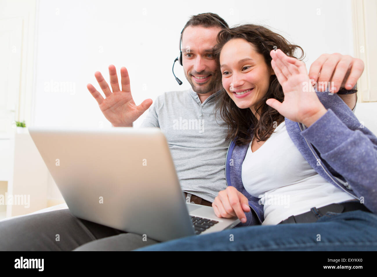 Happy couple on a video call hi-res stock photography and images - Alamy