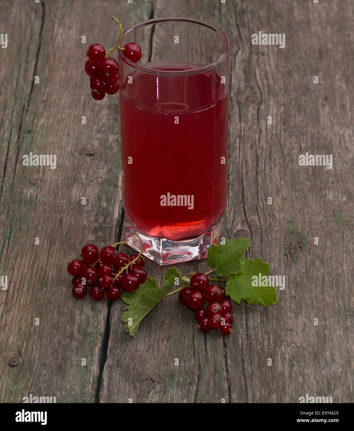 the glass of juice decorated with red currant Stock Photo - Alamy
