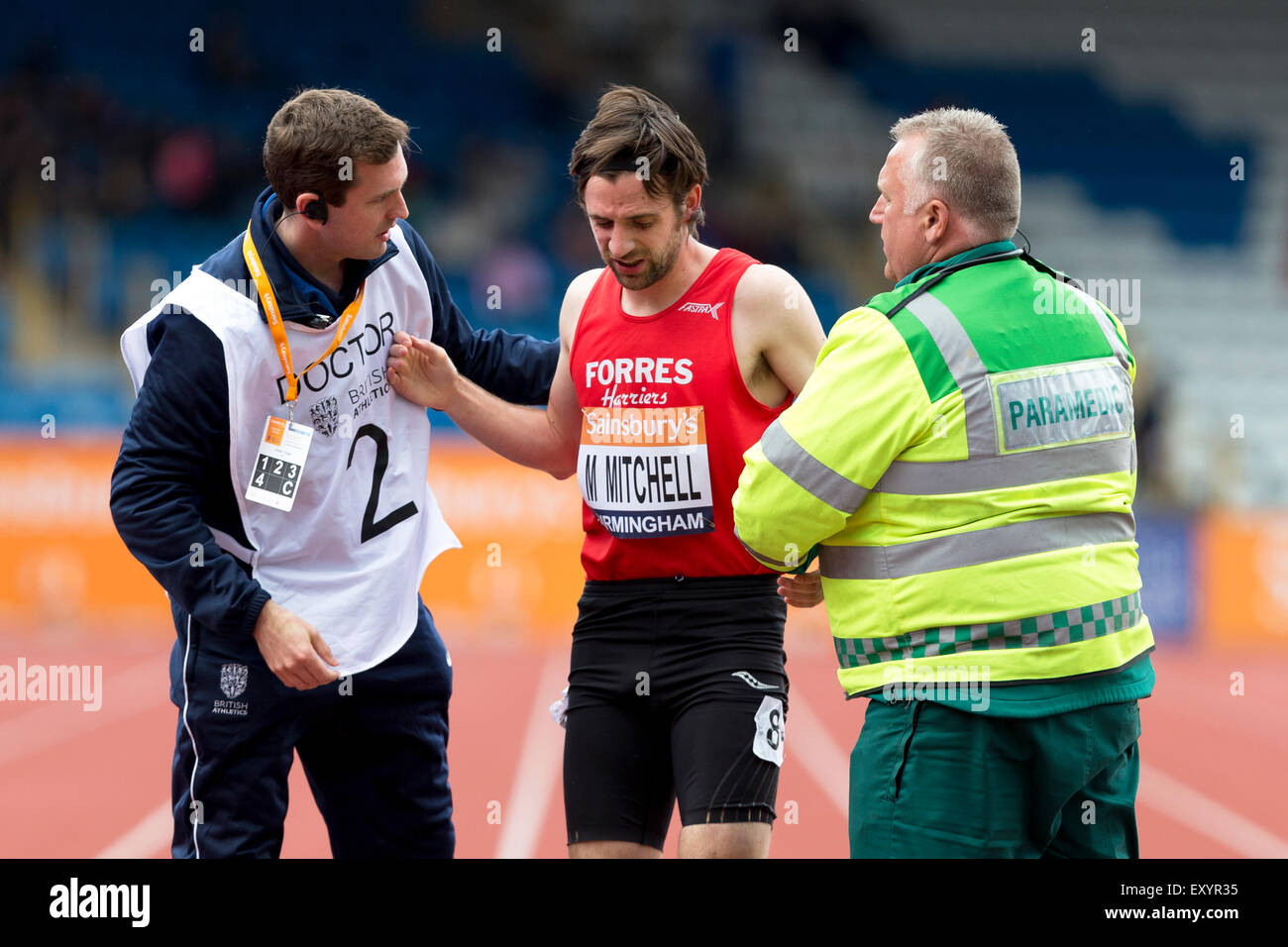Mark MITCHELL receiving medical attention after the Men's 1500m Heat 2 ...