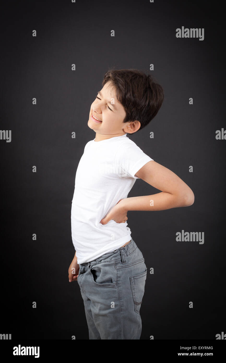 Boy bending over back hi-res stock photography and images - Alamy