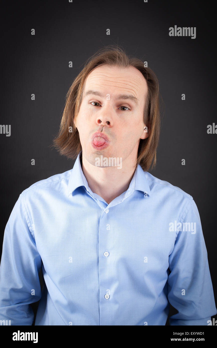 Handsome man doing different expressions in different sets of clothes ...