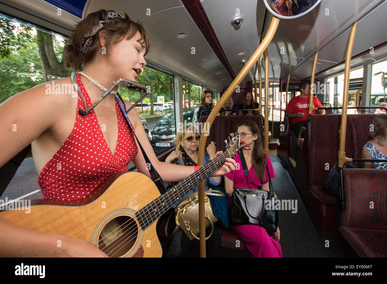 London, July 18th 2015. Regular Southbank busker Emily Lee sings songs ...