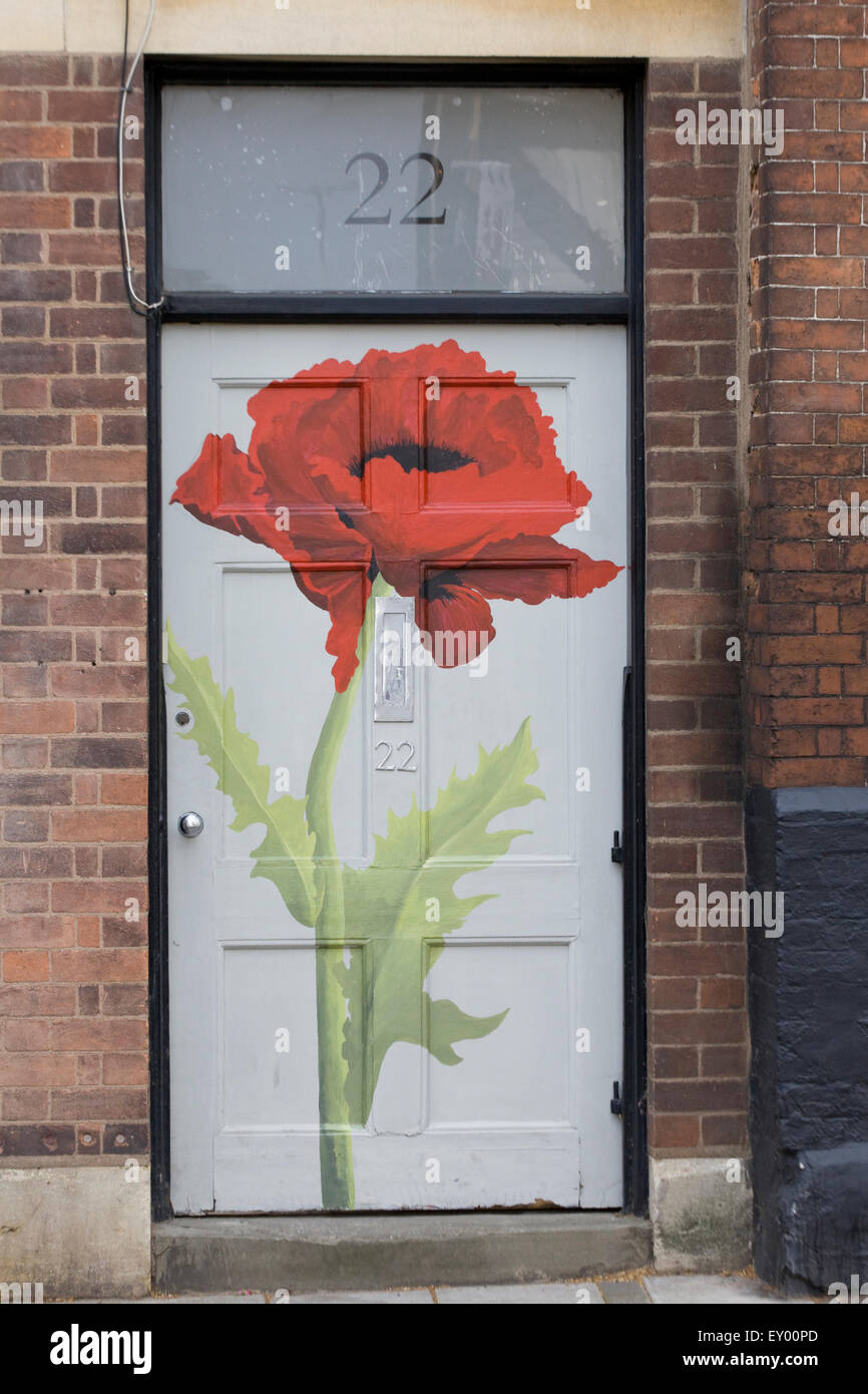 Poppy painted on a front door Stock Photo - Alamy