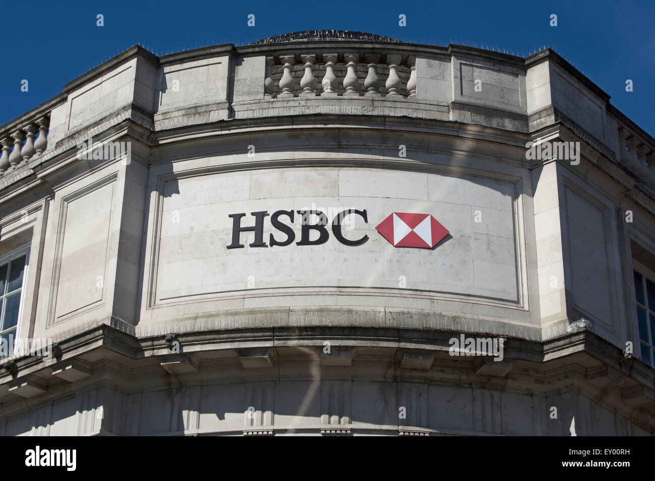 exterior with name and logo of a branch of hsbc bank occupying a 19th ...