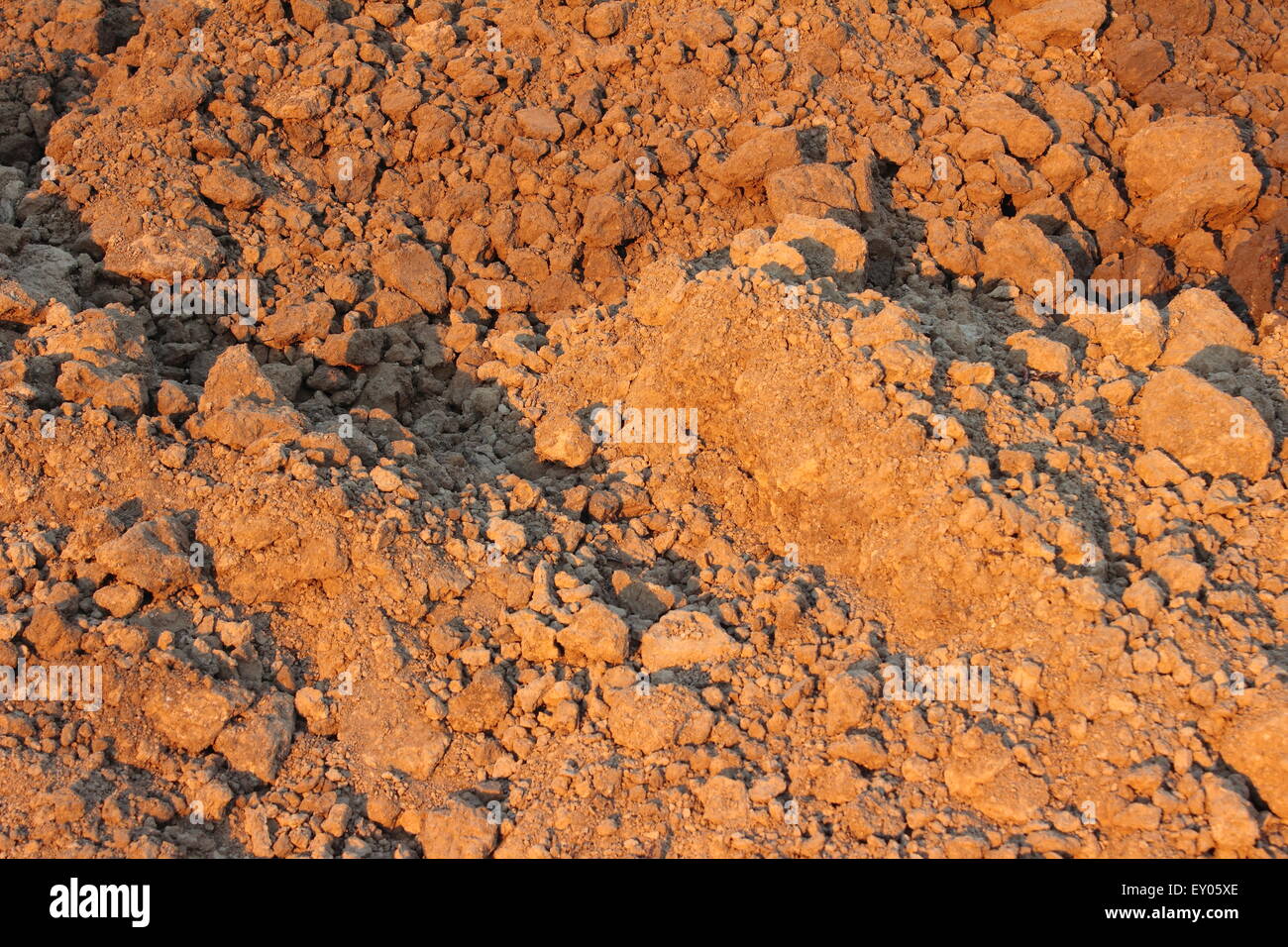 loose earth illuminated by the sun Stock Photo - Alamy