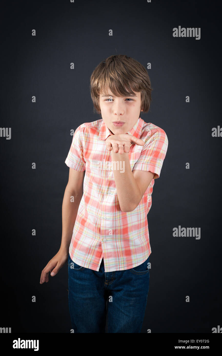 Handsome boy doing different expressions in different sets of clothes ...