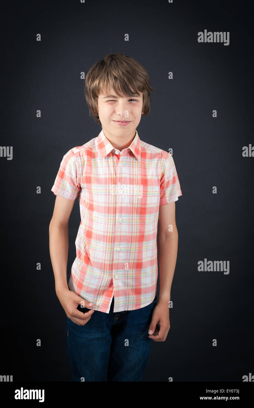 Handsome boy doing different expressions in different sets of clothes ...