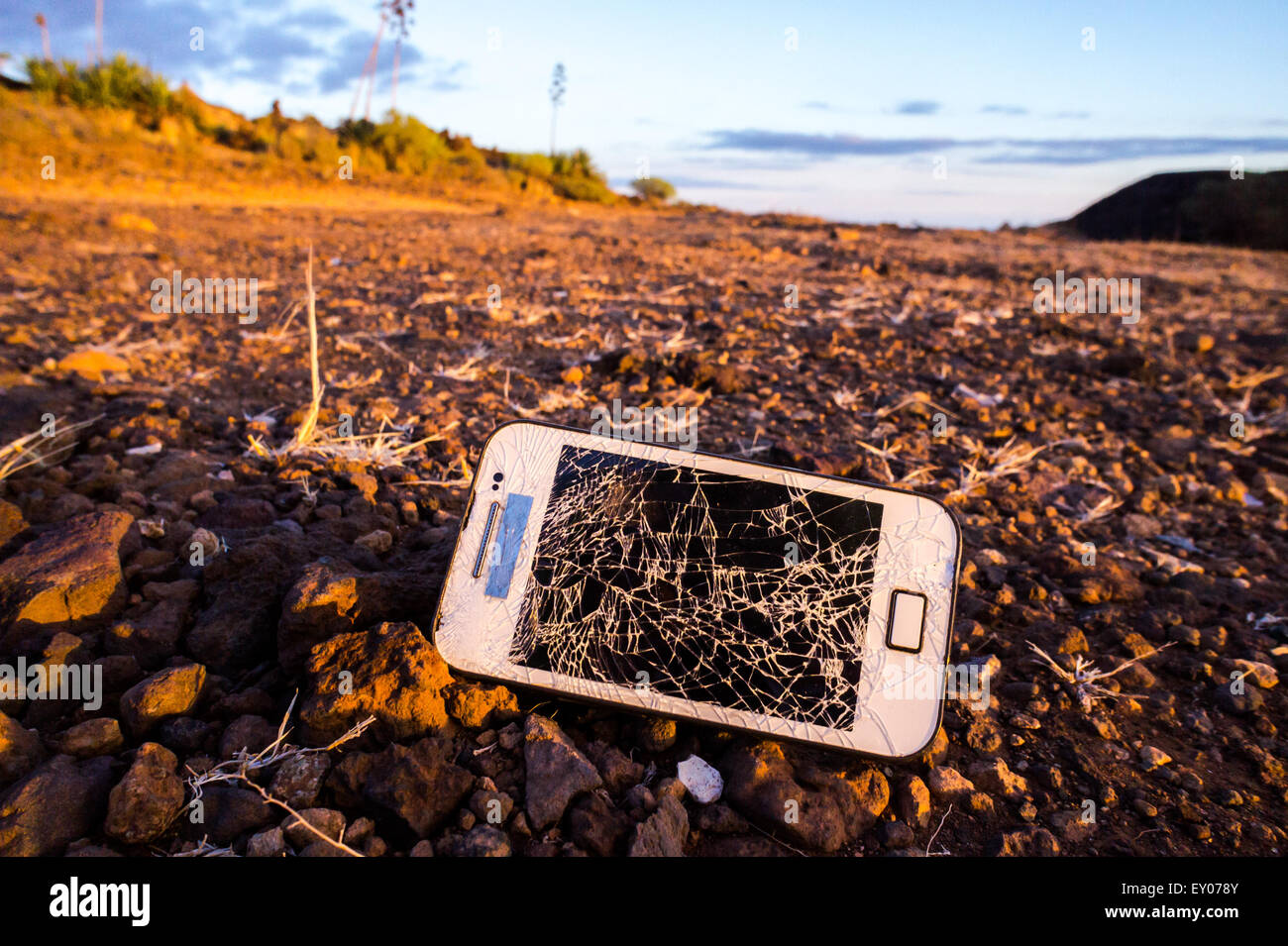 White Smartphone with Broken Display Stock Photo - Alamy