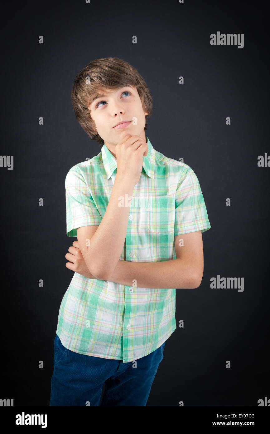 Handsome boy doing different expressions in different sets of clothes ...