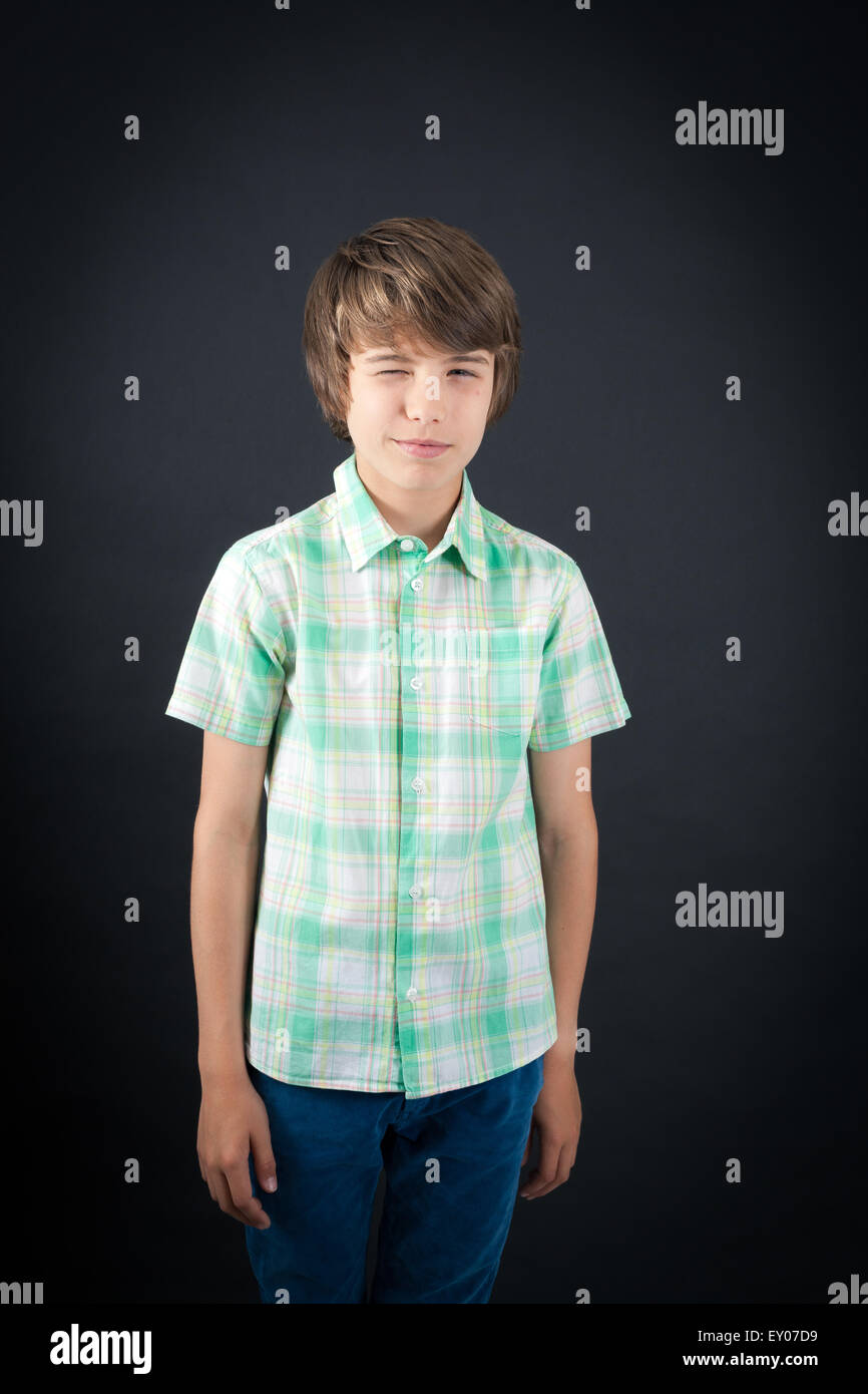 Handsome boy doing different expressions in different sets of clothes ...