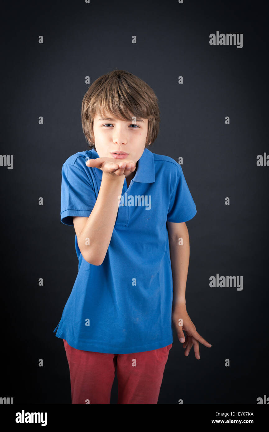 Handsome boy doing different expressions in different sets of clothes ...