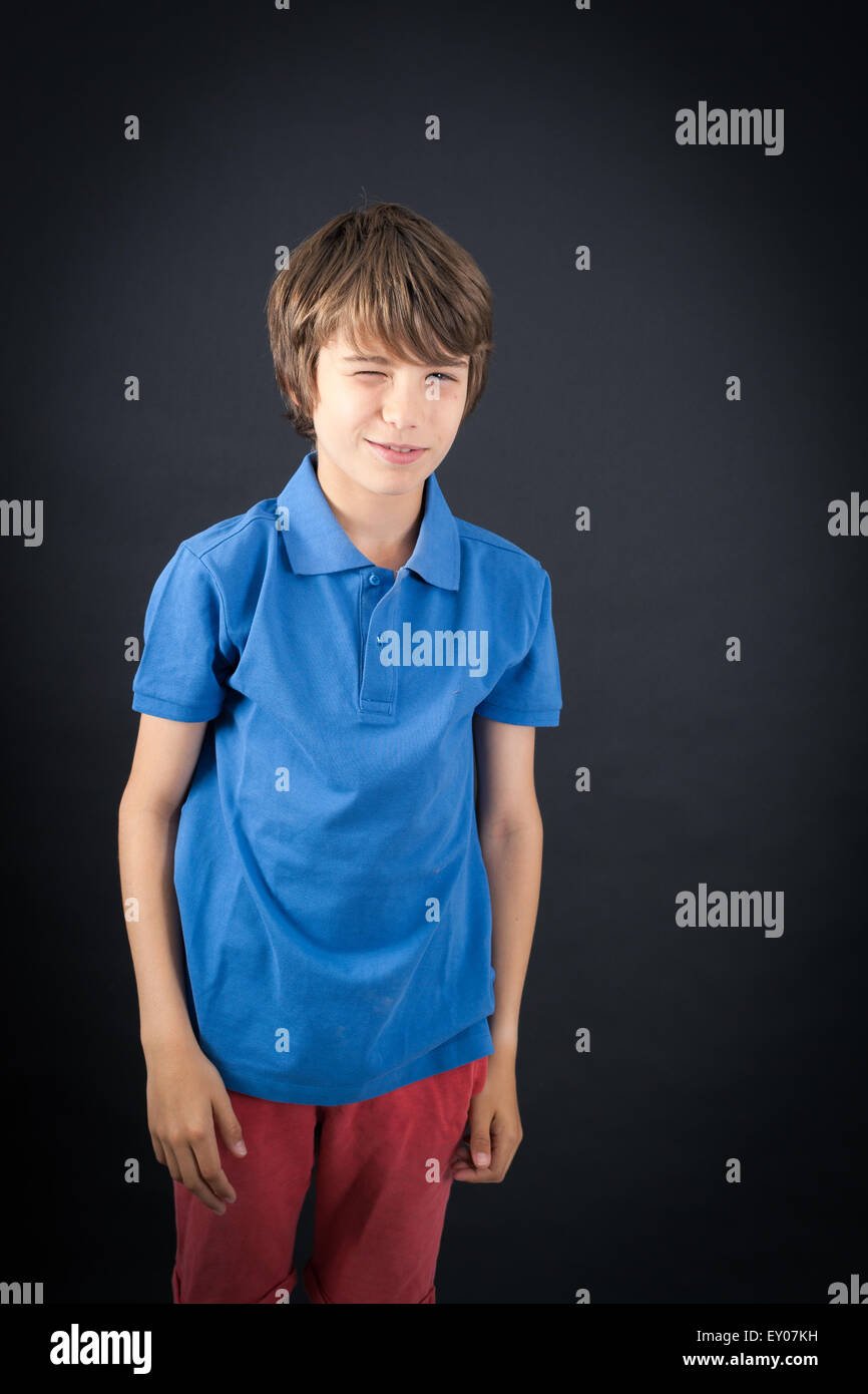 Handsome boy doing different expressions in different sets of clothes ...