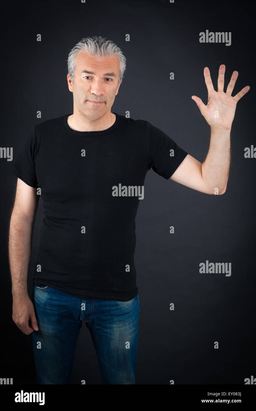 Handsome man doing different expressions in different sets of clothes ...