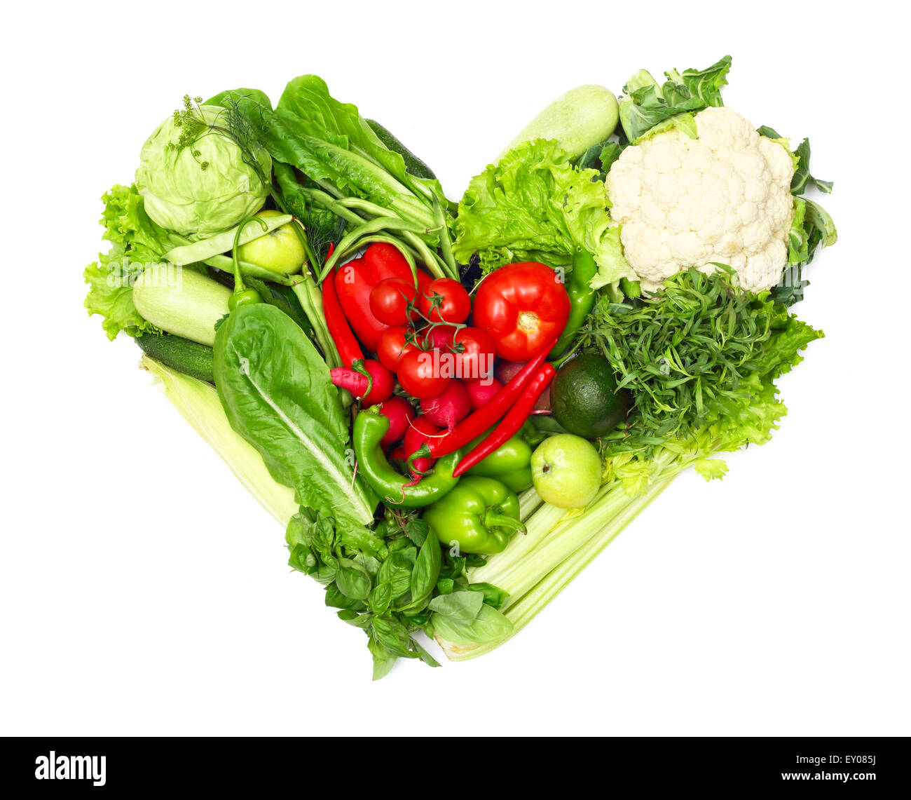 Pile of vegetables shaped as heart isolated on white background Stock ...