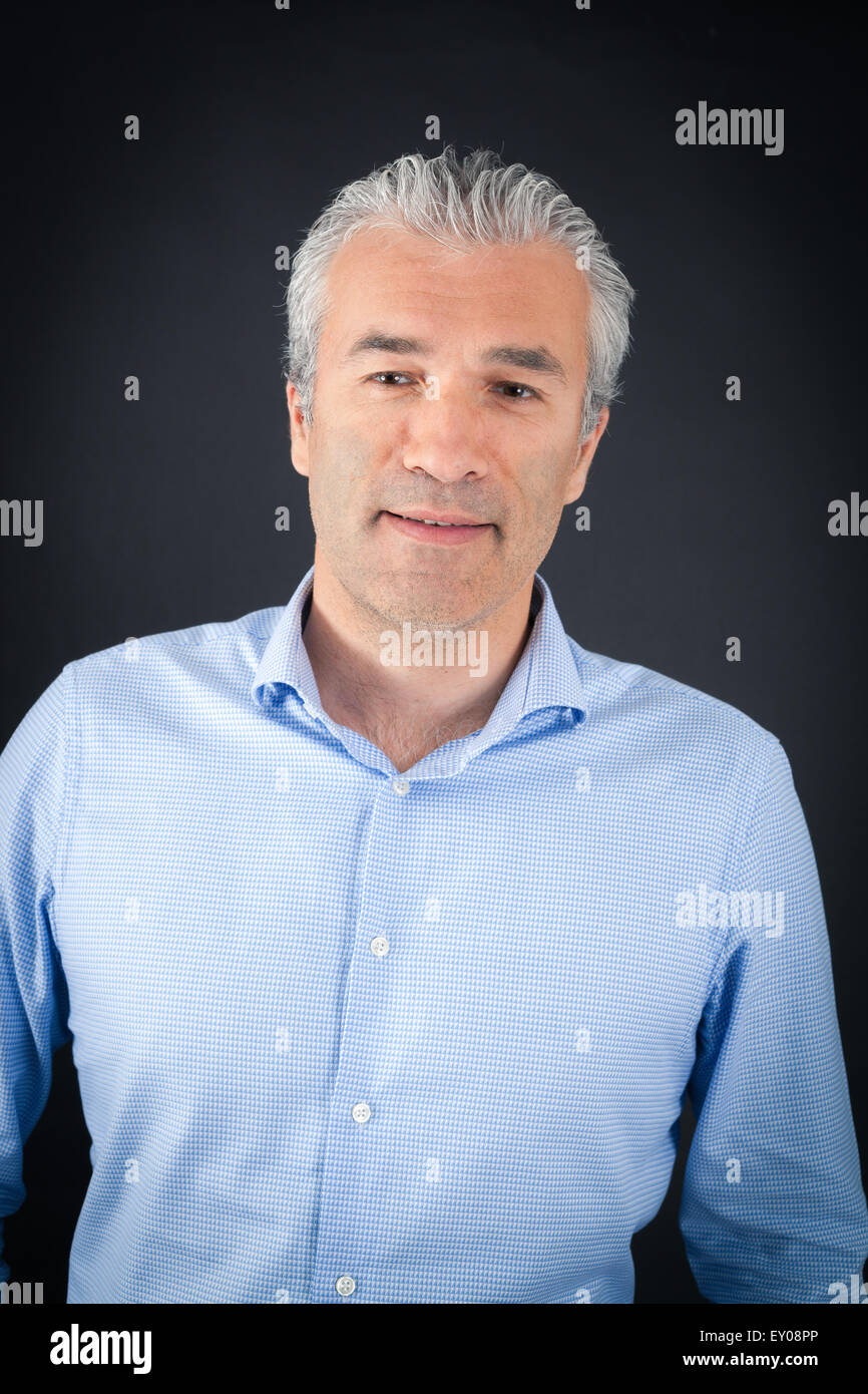 Handsome man doing different expressions in different sets of clothes ...