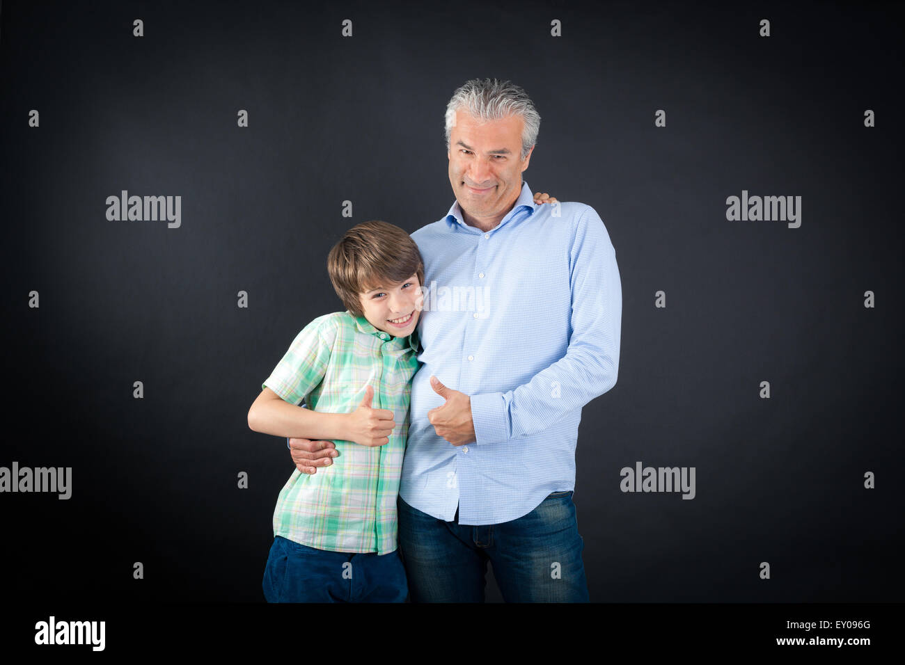 Handsome family doing different expressions in different sets of ...