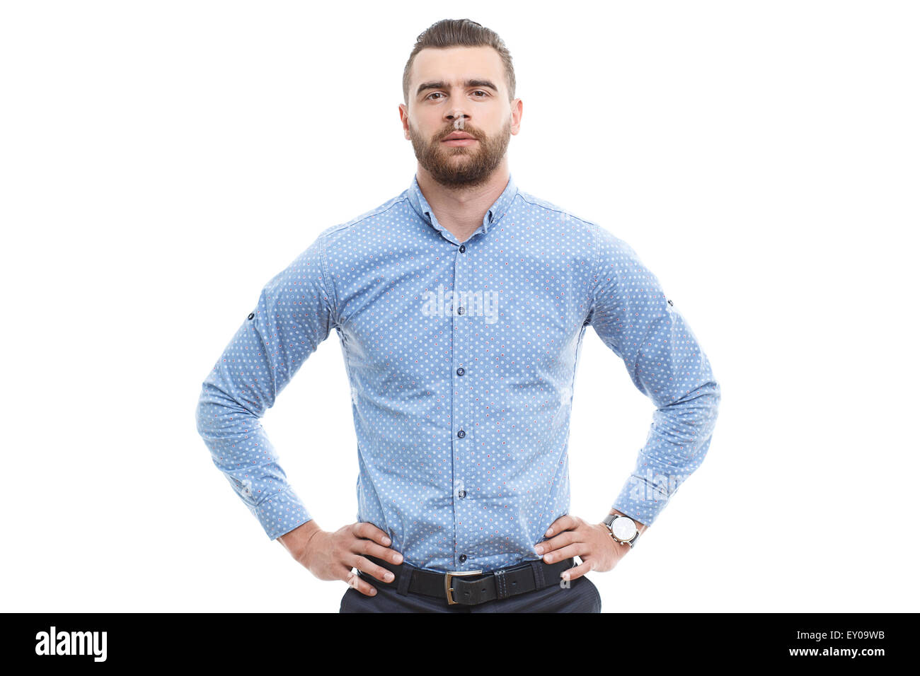 Handsome man with hands on his hips Stock Photo - Alamy