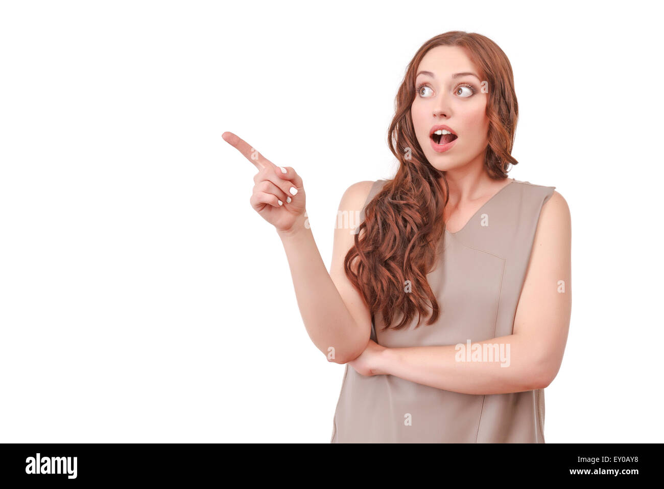 Red-haired woman pointing with index finger Stock Photo - Alamy