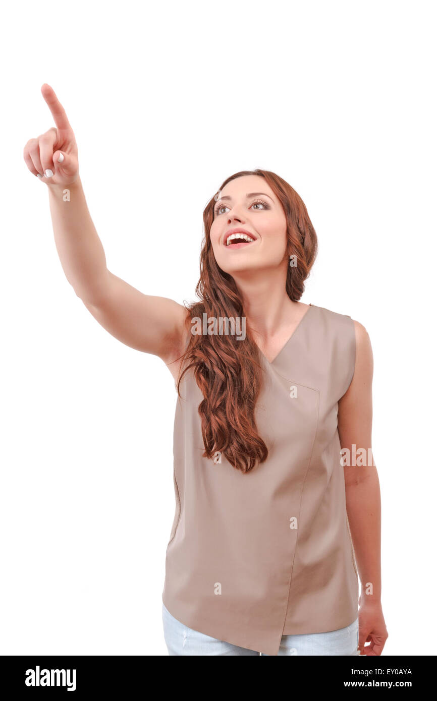 Red-haired woman pointing with index finger Stock Photo - Alamy