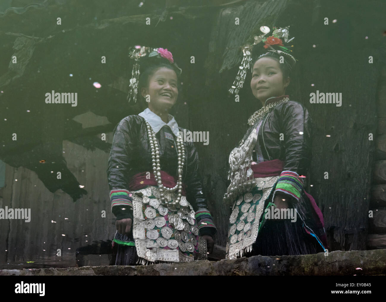 Reflections of two village beauties in traditional attire, Huanggang ...