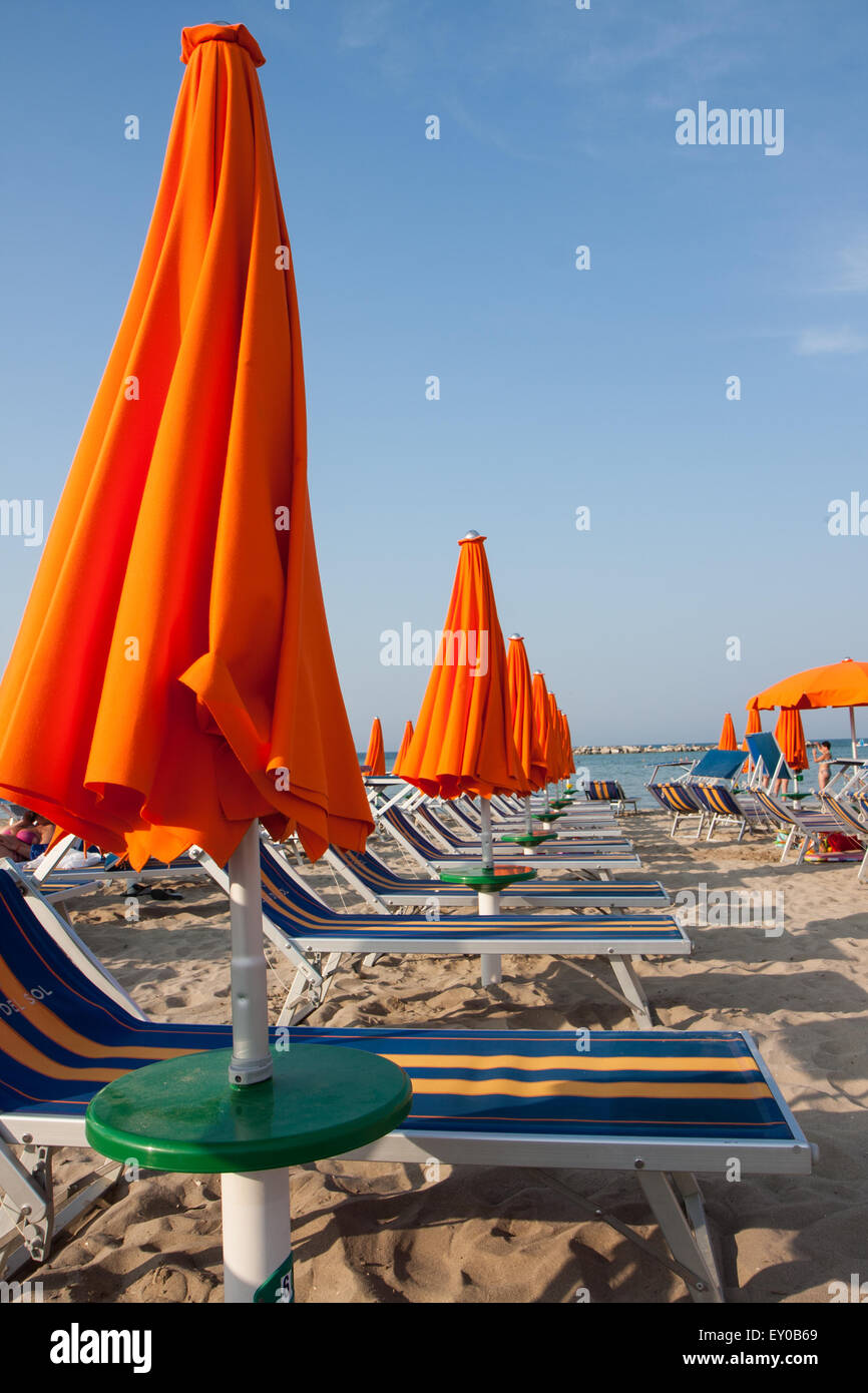 Umbrellas and sunbeds in Rimini and Riccione and Cattolica Beach, Italy ...