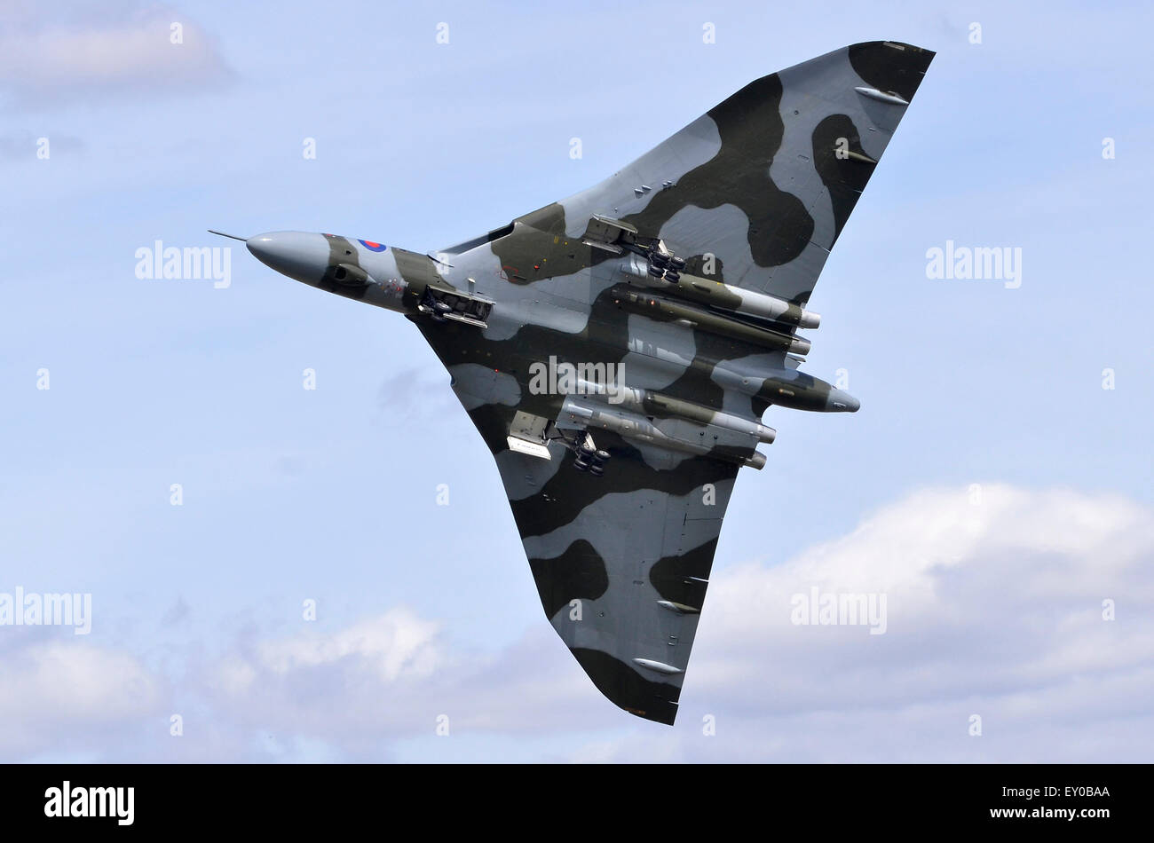 Avro Vulcan B2 bomber aircraft in RAF camouflage banking away from a ...