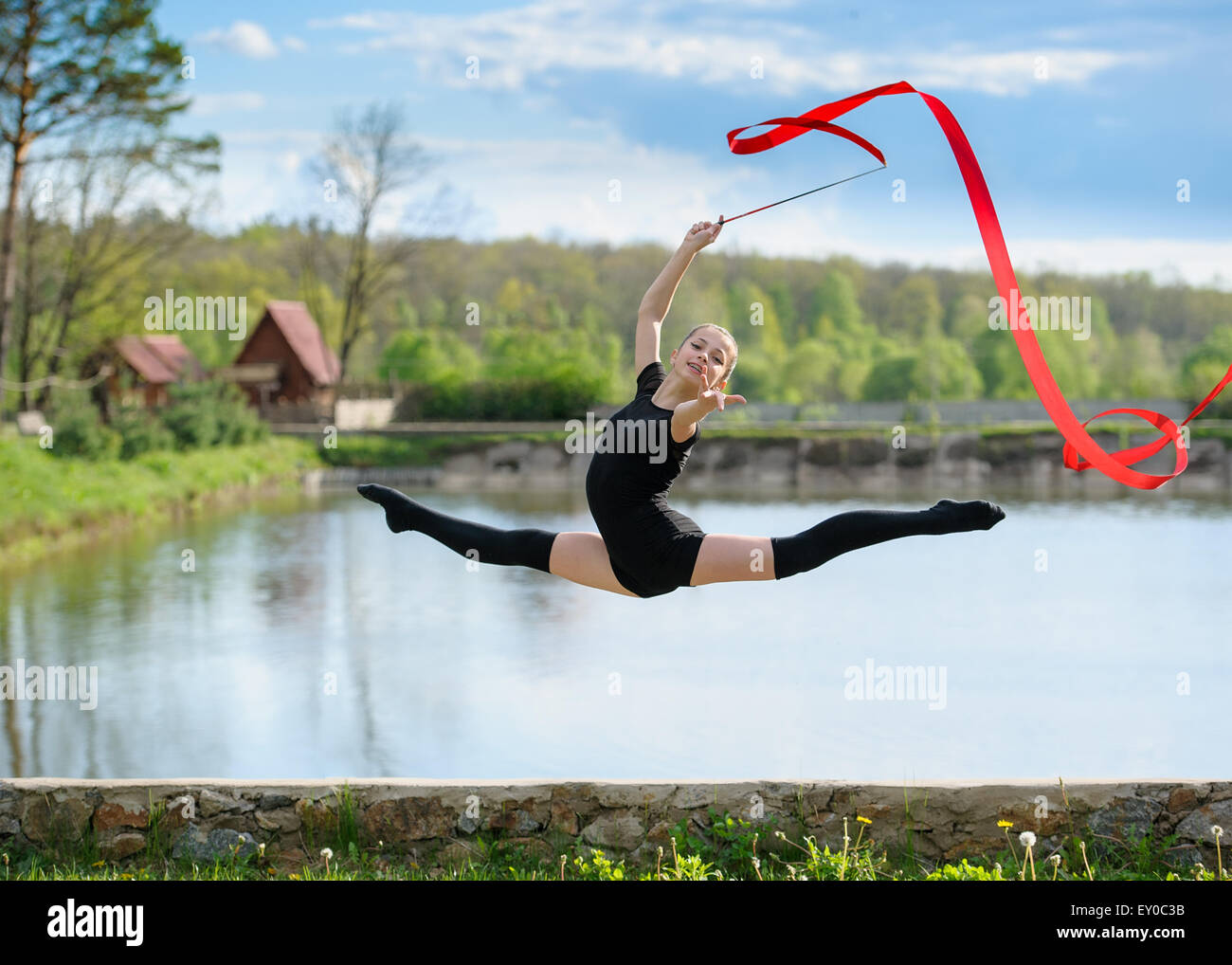 Young Gymnast Shows Split Jump Stock Photo - Alamy