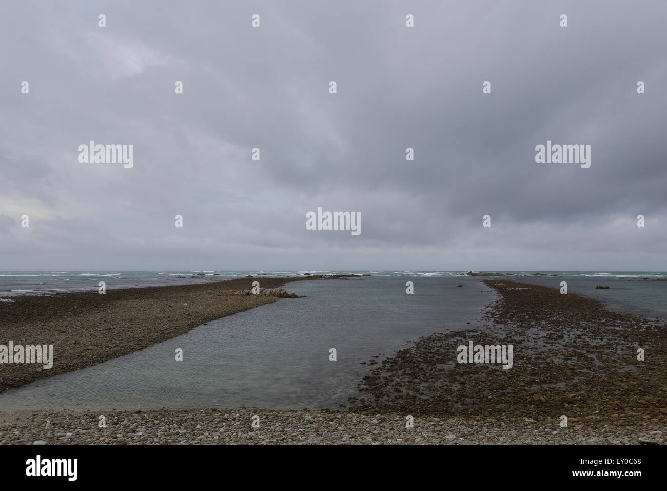 Rocky beach close to Suiderstrand on an overcast day Stock Photo - Alamy