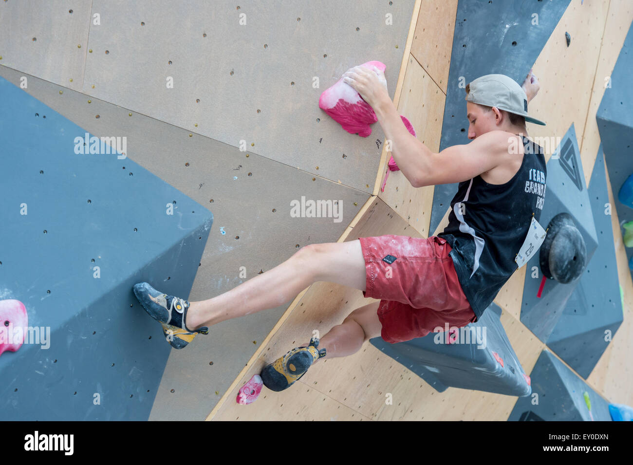 Montreal, Canada. 18th July, 2015. A young athlete climbs a route ...