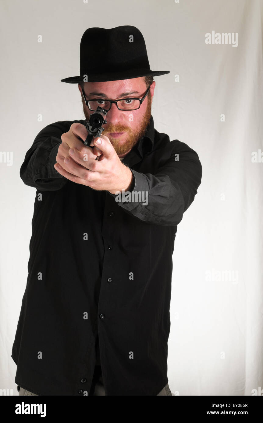 Man Holding a Pistol Gun Stock Photo - Alamy