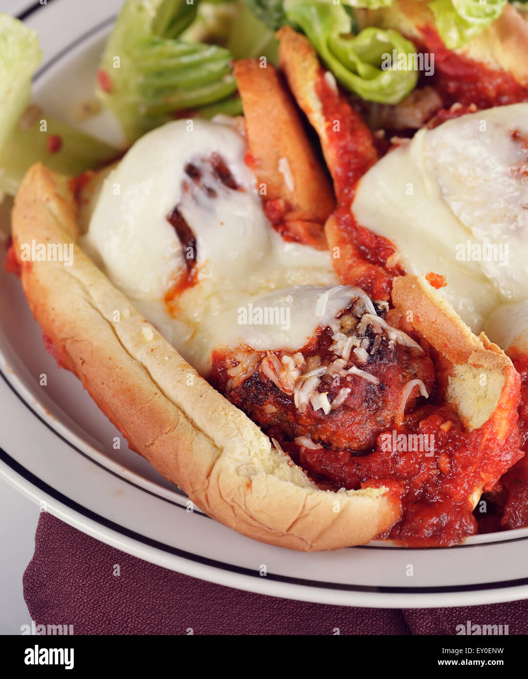 Meatball Sandwiches With Mozzarella Cheese And Salad Stock Photo - Alamy