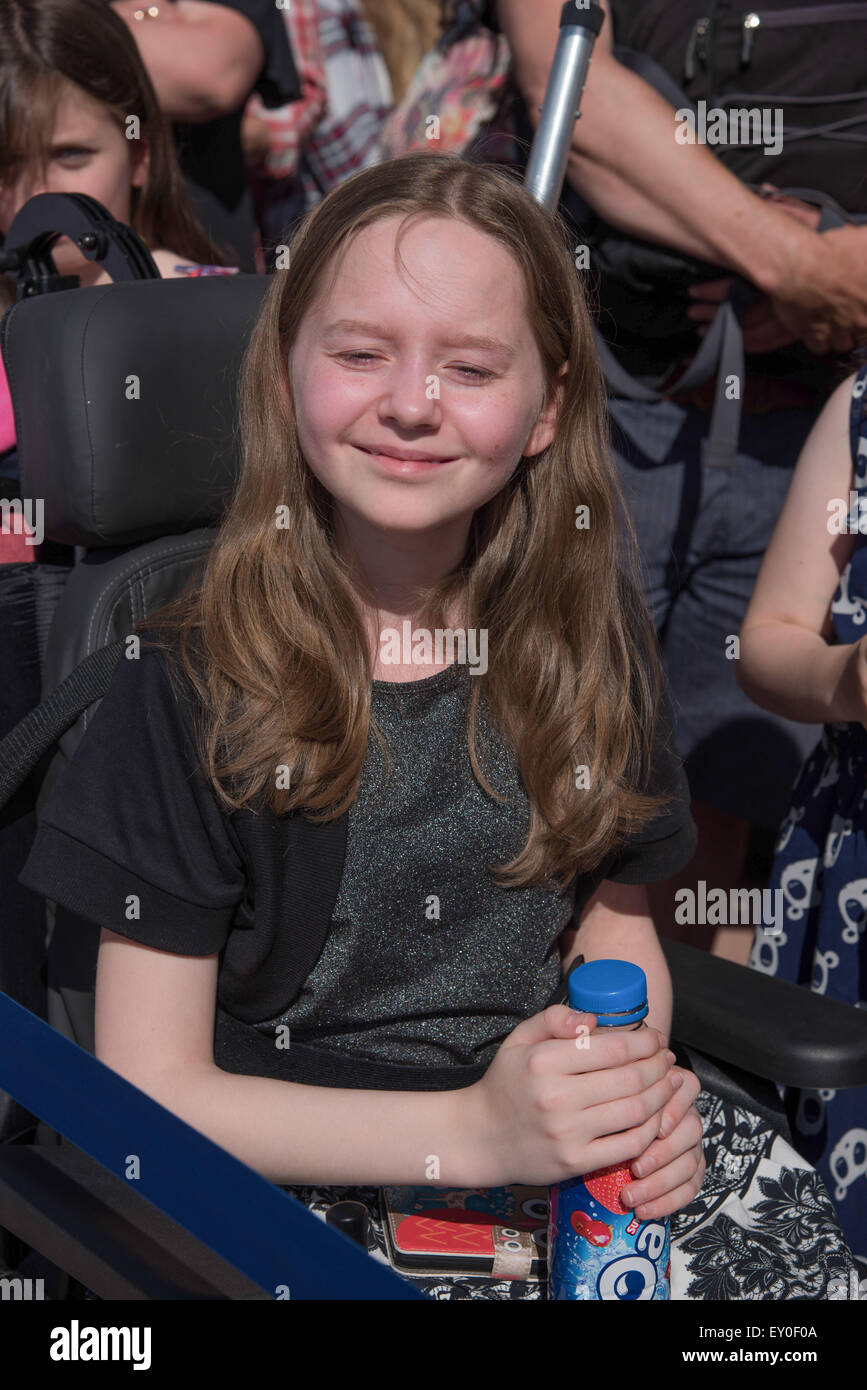 London, UK. 18th July, 2015. Amelia Brown 12 is on a wheel chair and ...