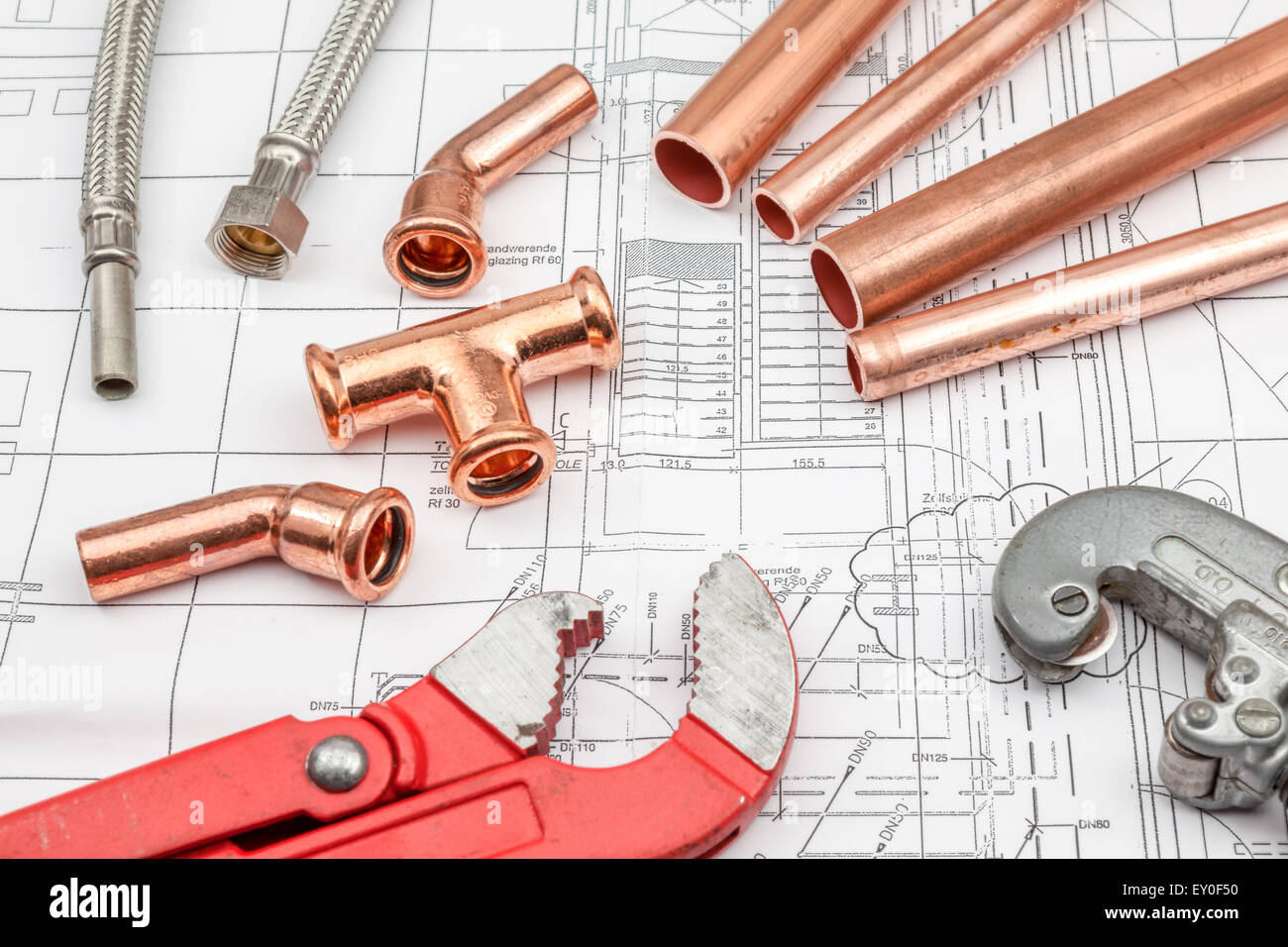 Plumbing Tools Arranged On House Plans whit copper tubes Stock Photo ...