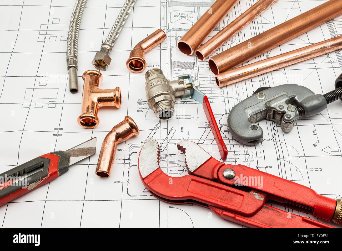 Plumbing Tools Arranged On House Plans whit copper tubes Stock Photo ...