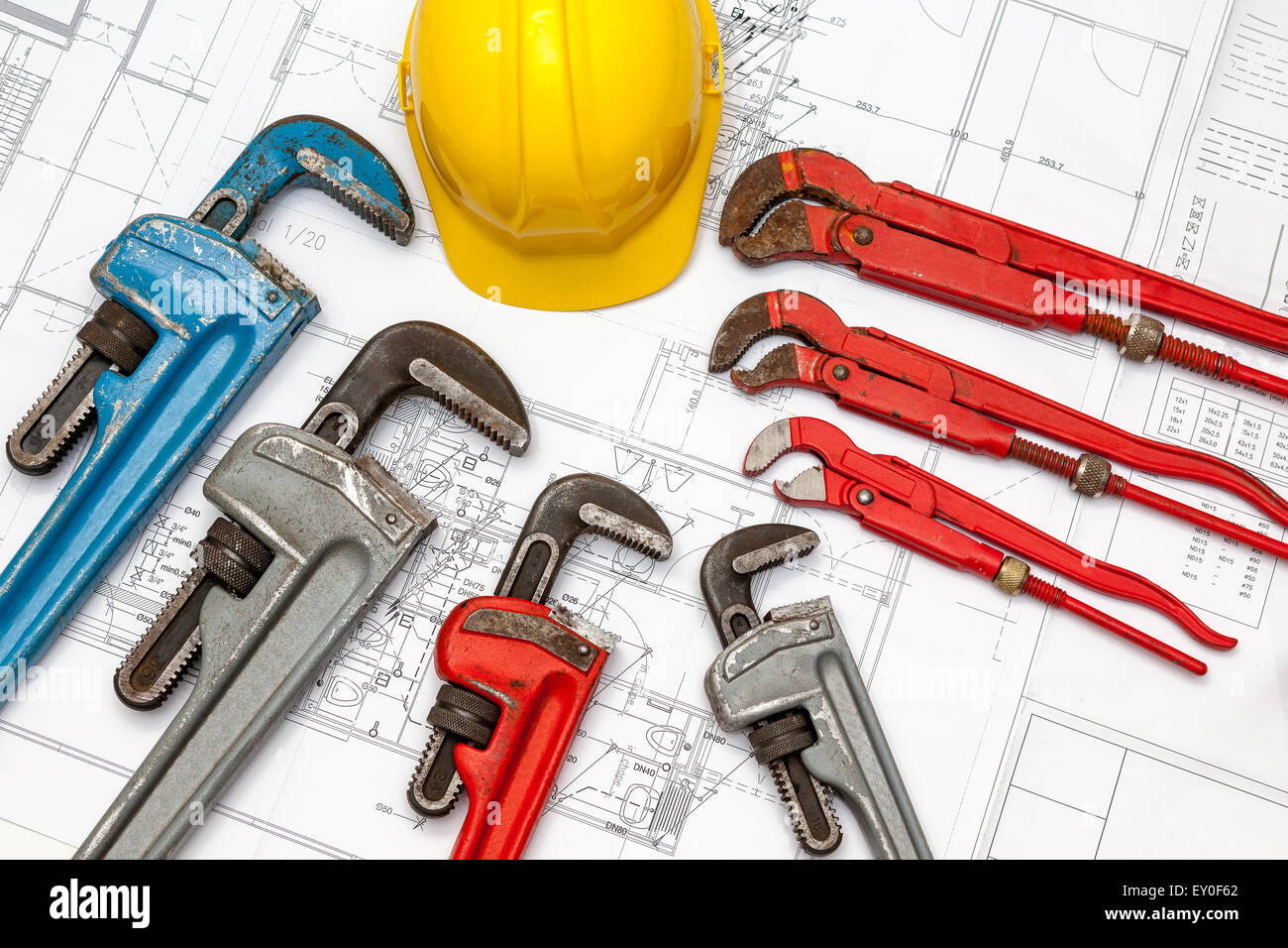Plumbing Tools Arranged On House Plans whit wrench and water valves ...