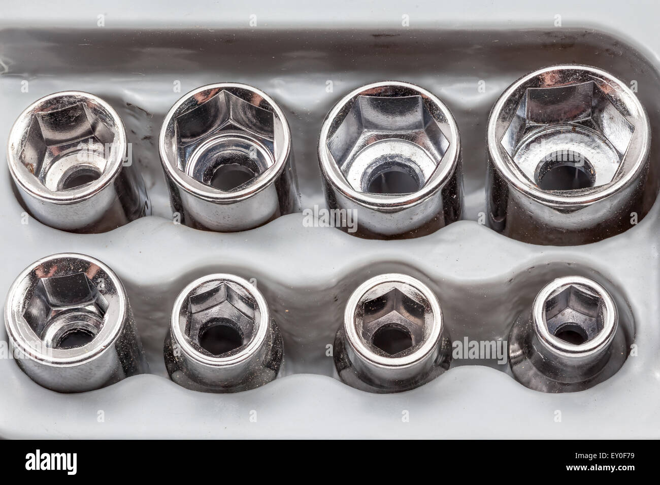 metal sockets is in a plastic socket wrench holder Stock Photo - Alamy