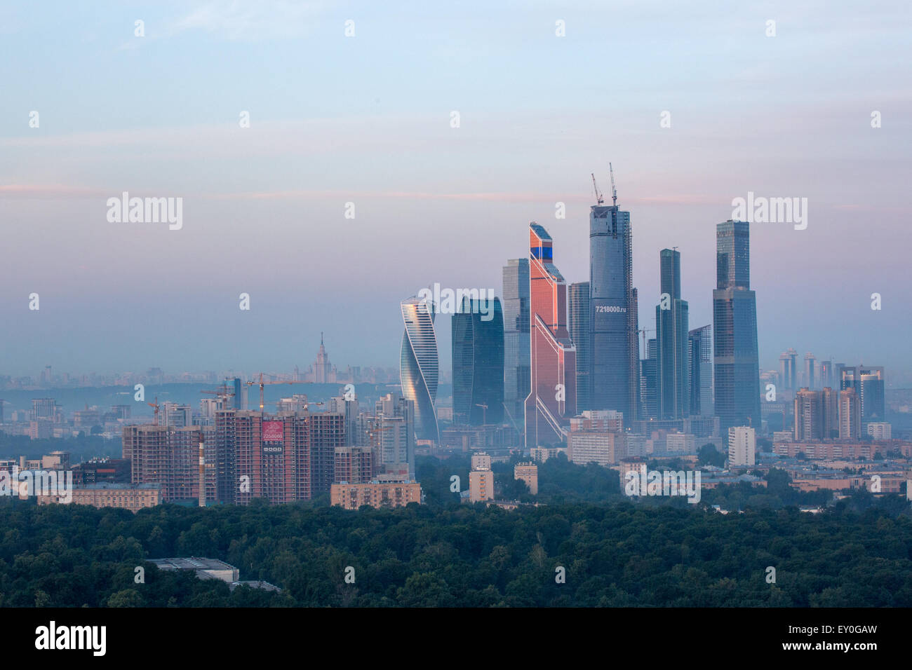 Sunrise over Moscow city with tall buildings in the photo. Cityscape ...