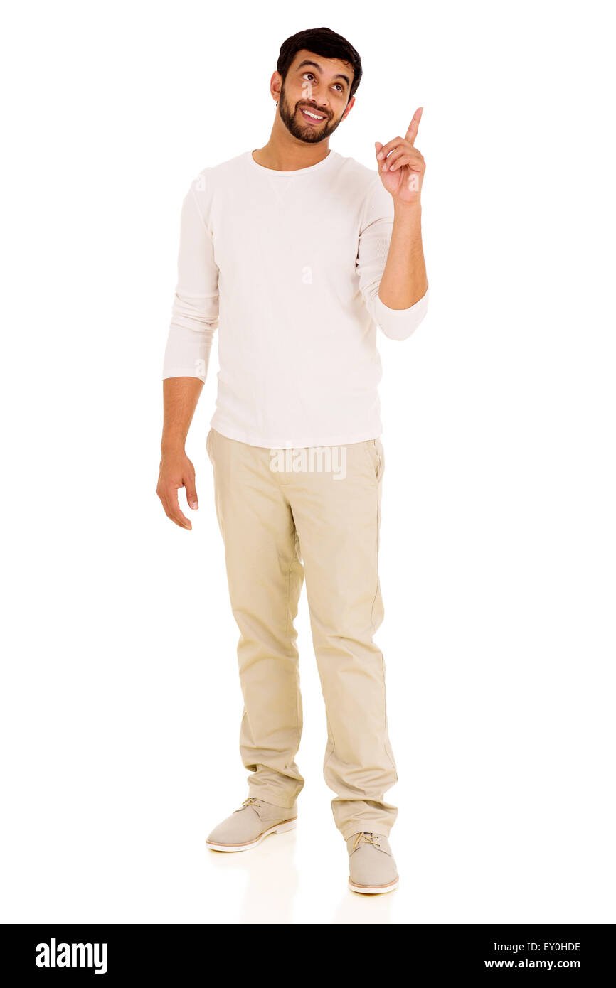 happy Indian man pointing up on white background Stock Photo - Alamy