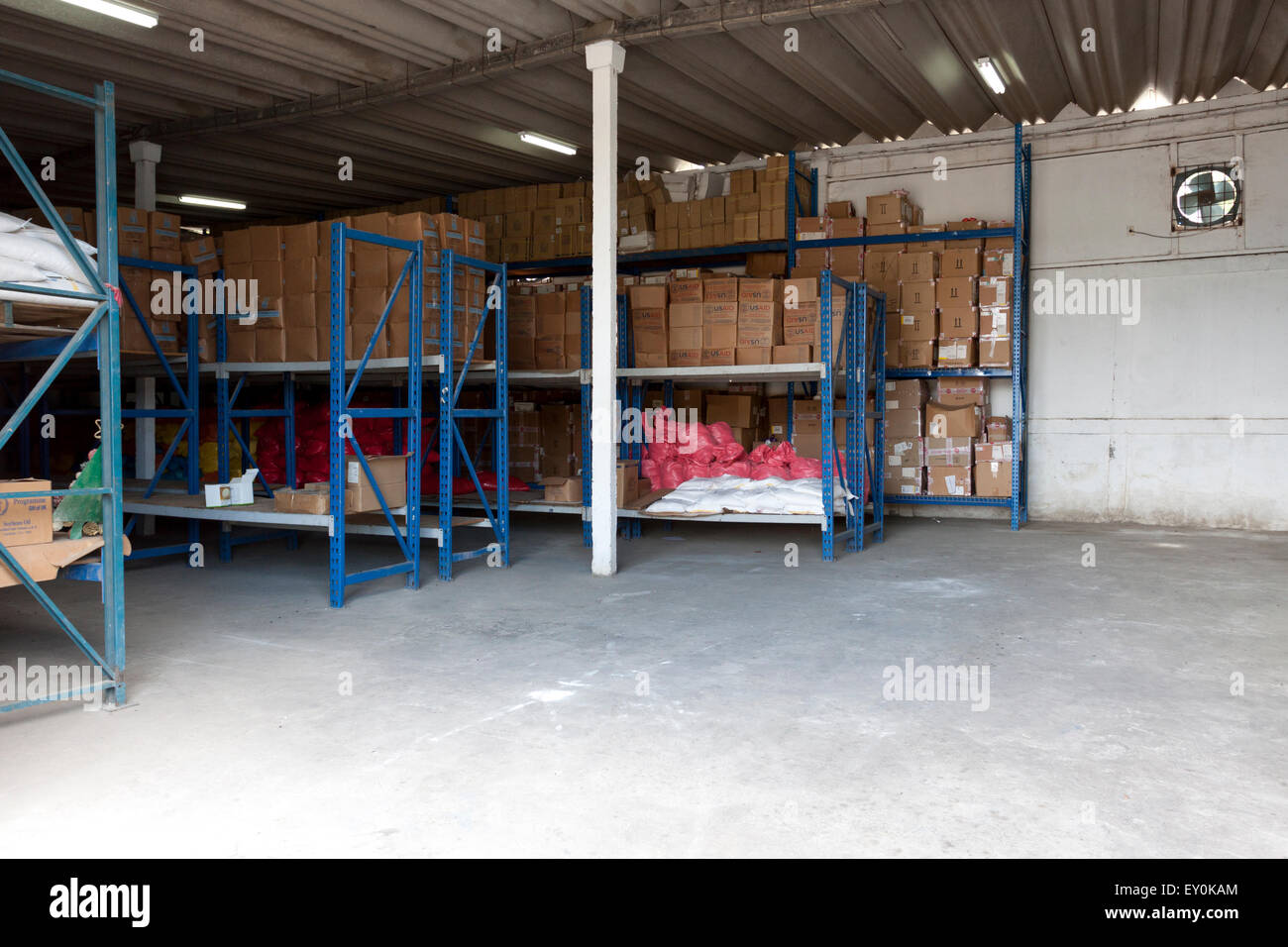 Warehouse with boxes of USAID stored Stock Photo - Alamy
