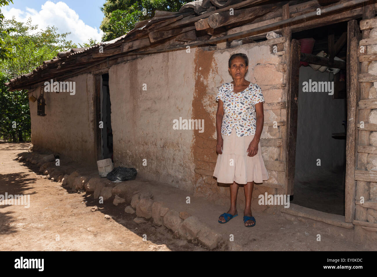 Nicaraguan villager standing at her home's doorstep in Carrizo, Cusmapa ...