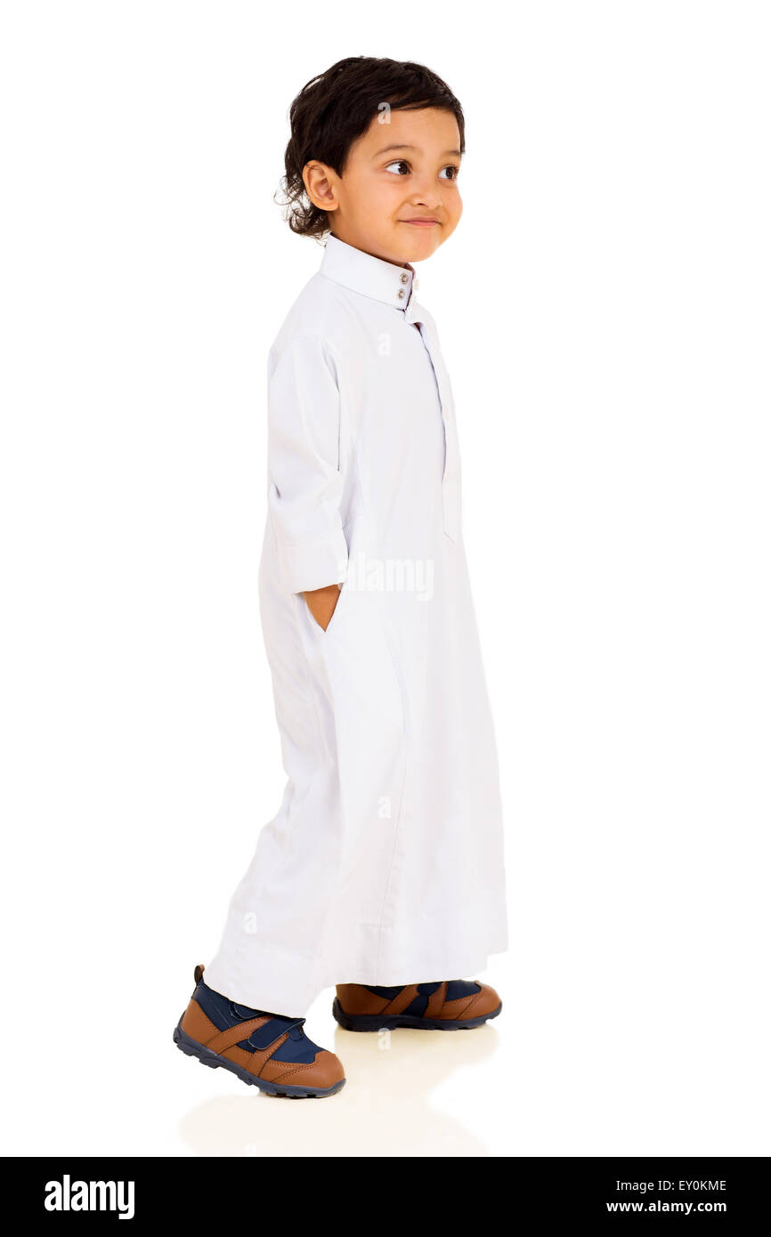 cute little Muslim boy walking on white background Stock Photo - Alamy