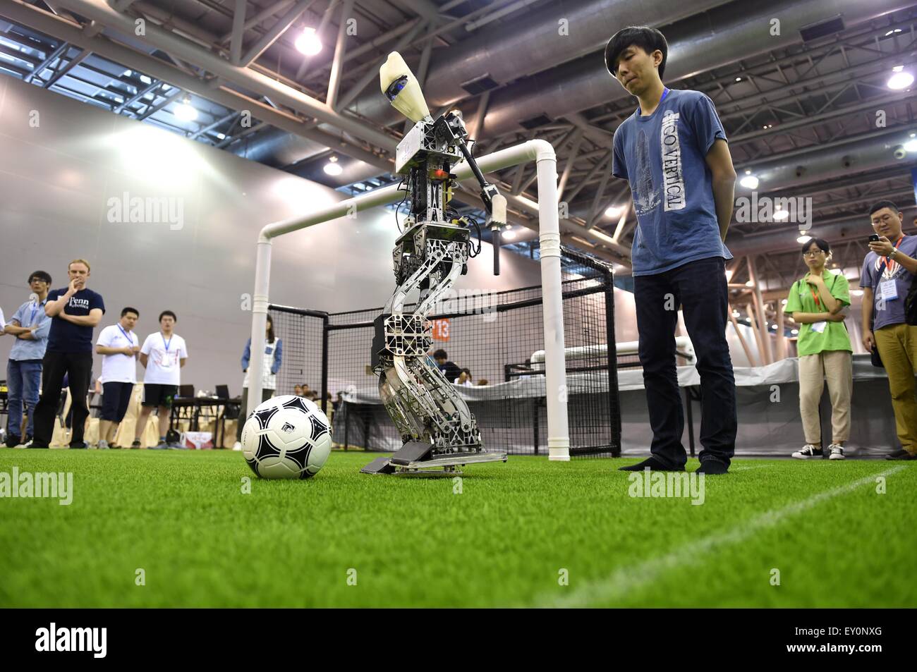Hefei, China's Anhui Province. 19th July, 2015. A robot plays football ...