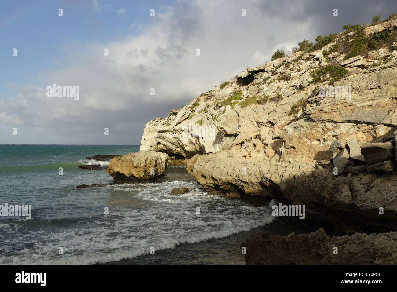 Entrance to the Waenhuiskrans cave (close to Arniston) at high tide ...