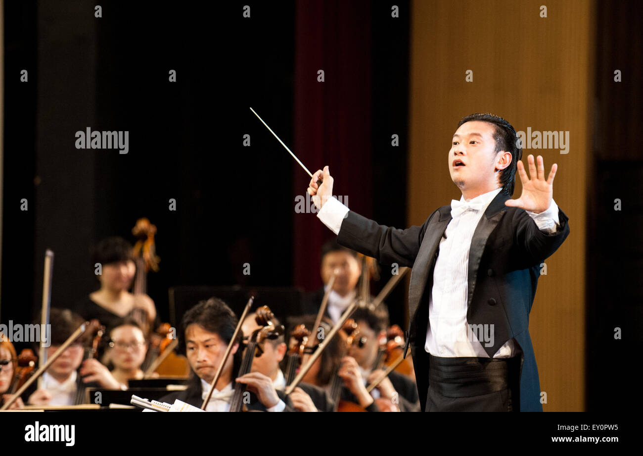Yuxi, China's Yunnan Province. 18th July, 2015. Conductor Zhang ...