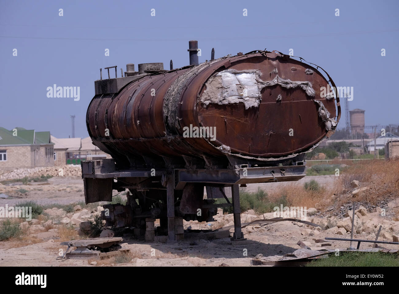 A rusted oil storage tank in Gobustan area Azerbaijan Stock Photo - Alamy