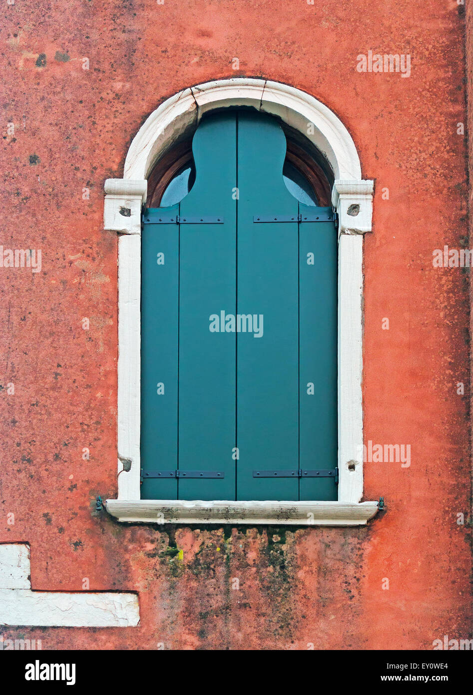 closed window in a red wall Stock Photo - Alamy